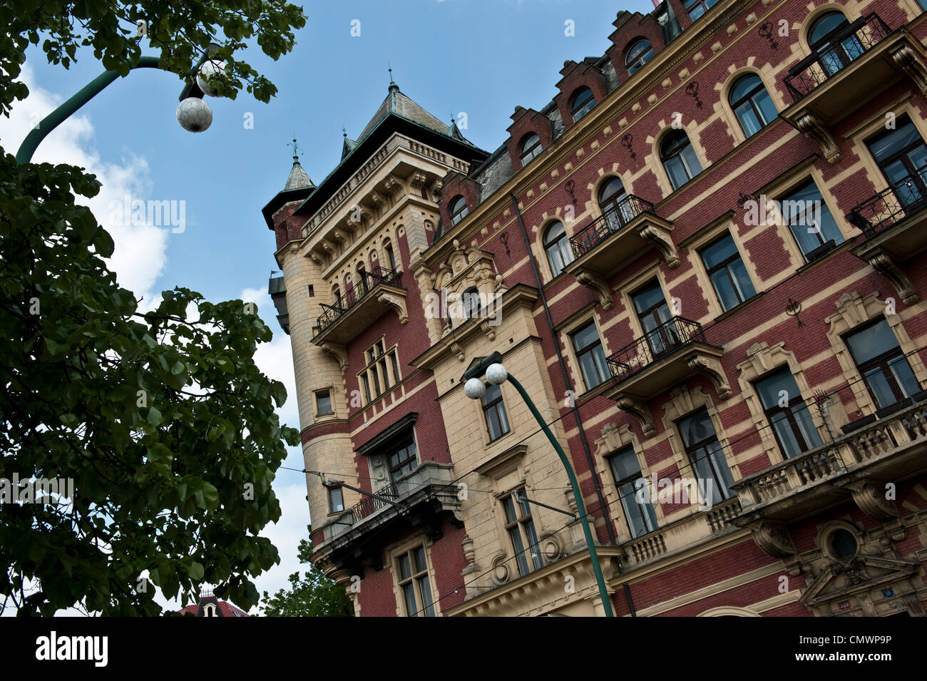 A beautiful diagonal shot of a burgundy building in Prague Stock Photo ...