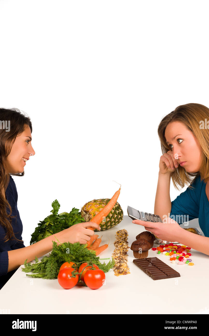 Healthy girl advising her friend about nutrition Stock Photo - Alamy