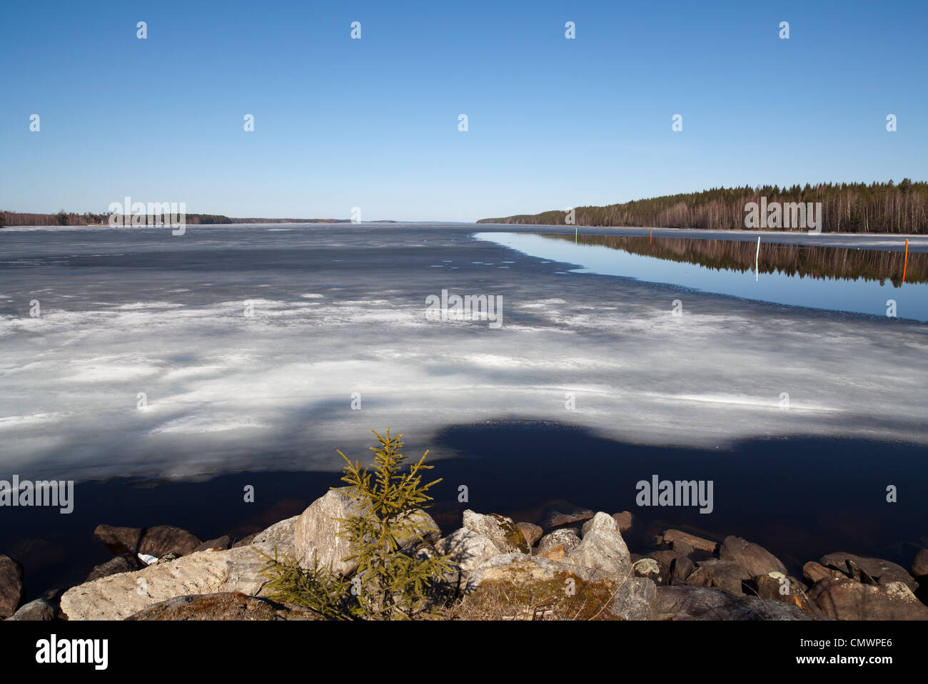 Melting ice on Iisvesi lake at Spring , Finland Stock Photo - Alamy