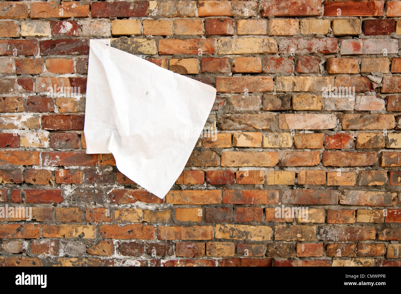 Old parchment on red brick hi-res stock photography and images - Alamy