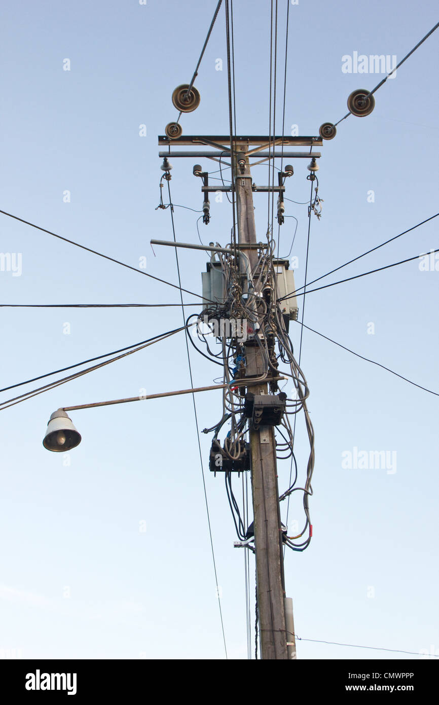 Street pole with electricity and telephone cables Stock Photo - Alamy