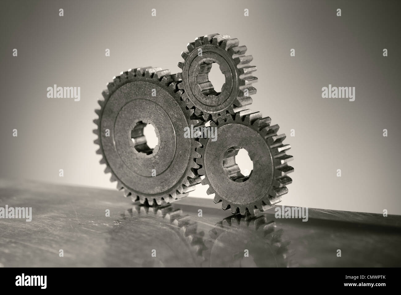 Three cog wheels reflection hi-res stock photography and images - Alamy
