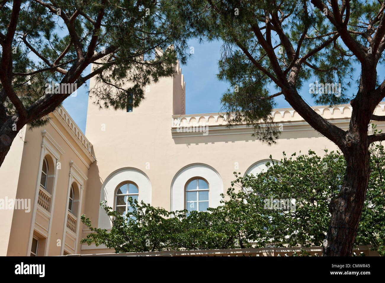 Trees outside of the corner wing of Prince Palace in Monaco Stock Photo ...
