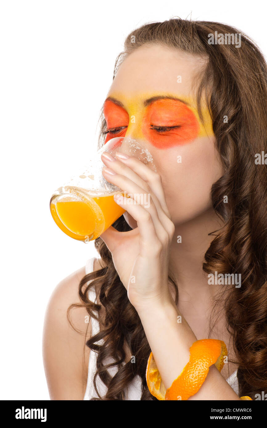 Girl drinking juice Stock Photo - Alamy