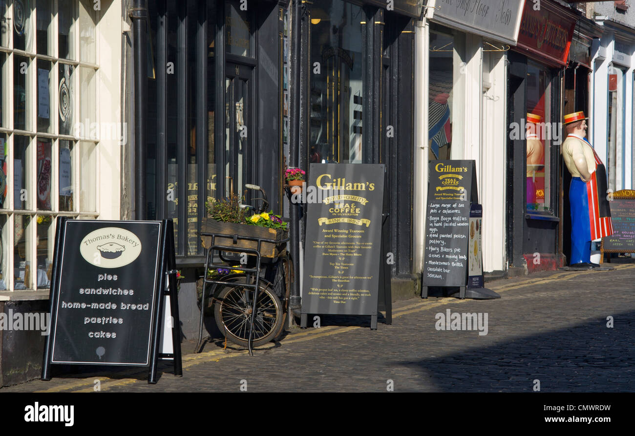 Small, independent shops on Market Street, in the town of Ulverston ...