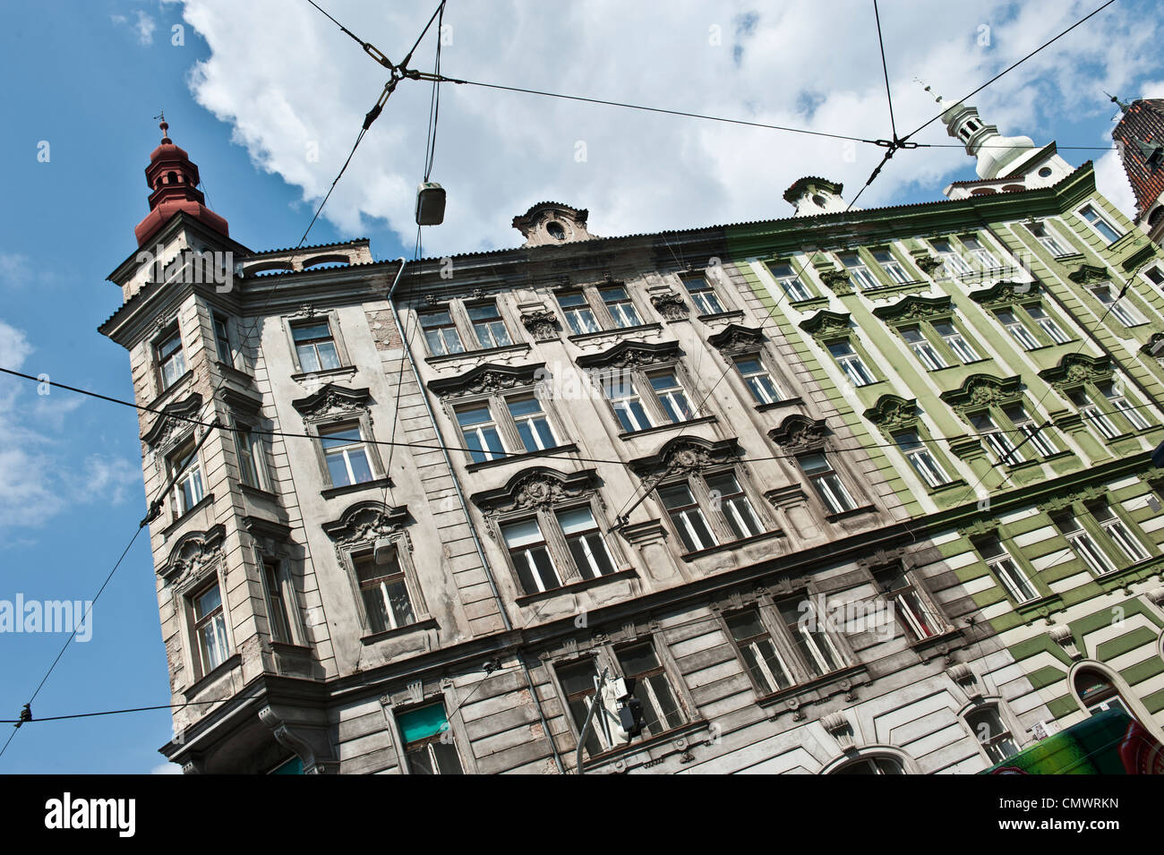Electrical wires raised in the air outside of buildings in Prague Stock ...