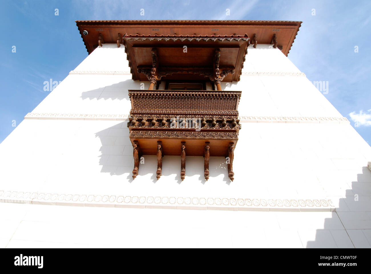 A meticulously carved wooden balcony on the side of the Shri ...