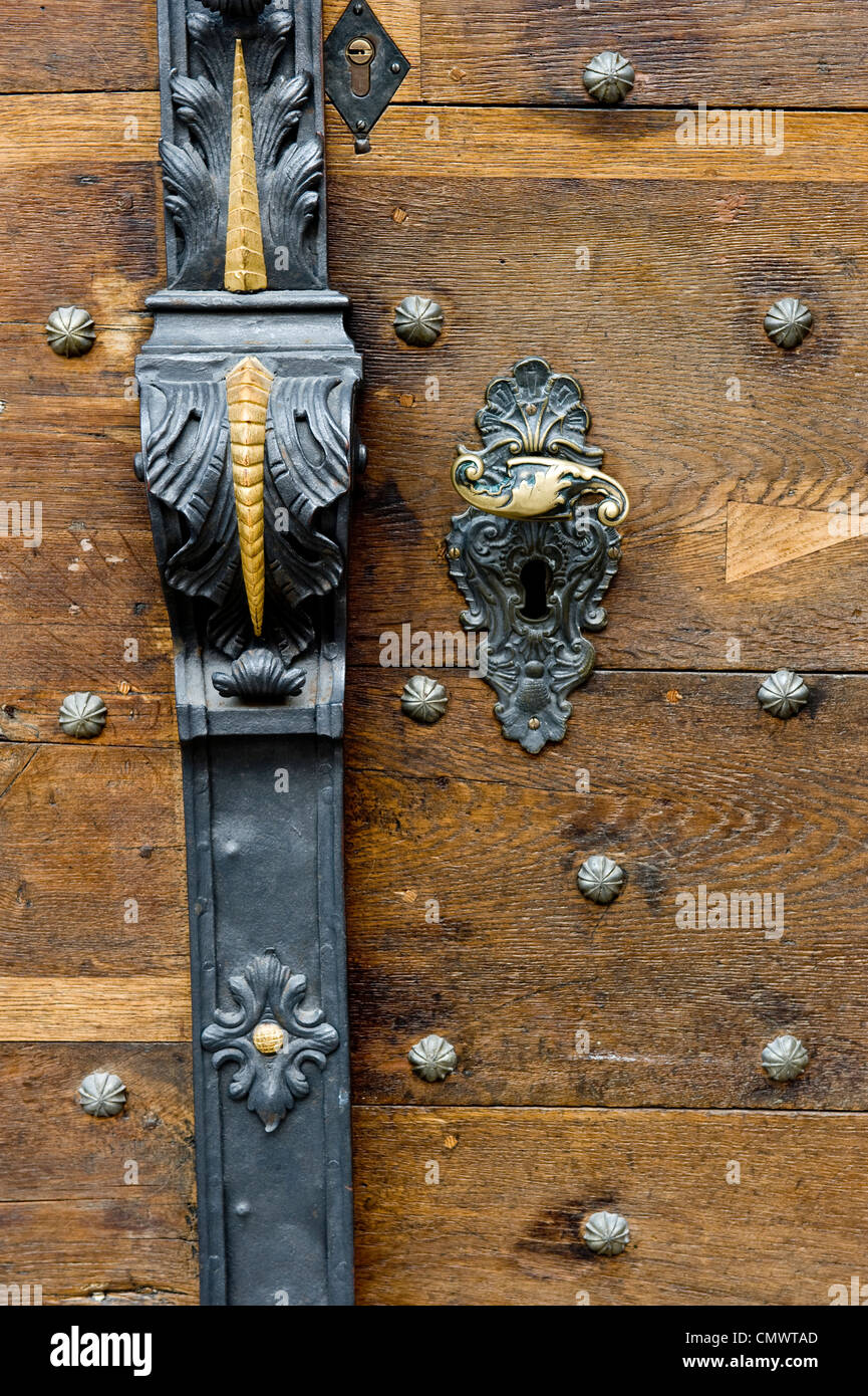Closeup of a decorative lock on a brown, wooden door Stock Photo - Alamy