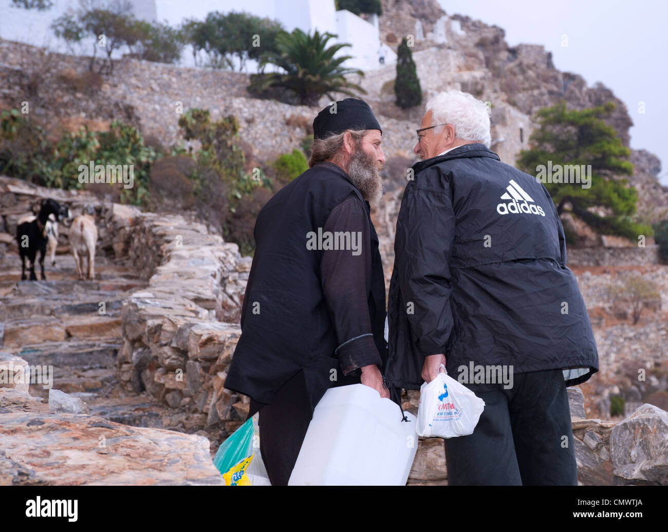 Priest talking man hi-res stock photography and images - Alamy