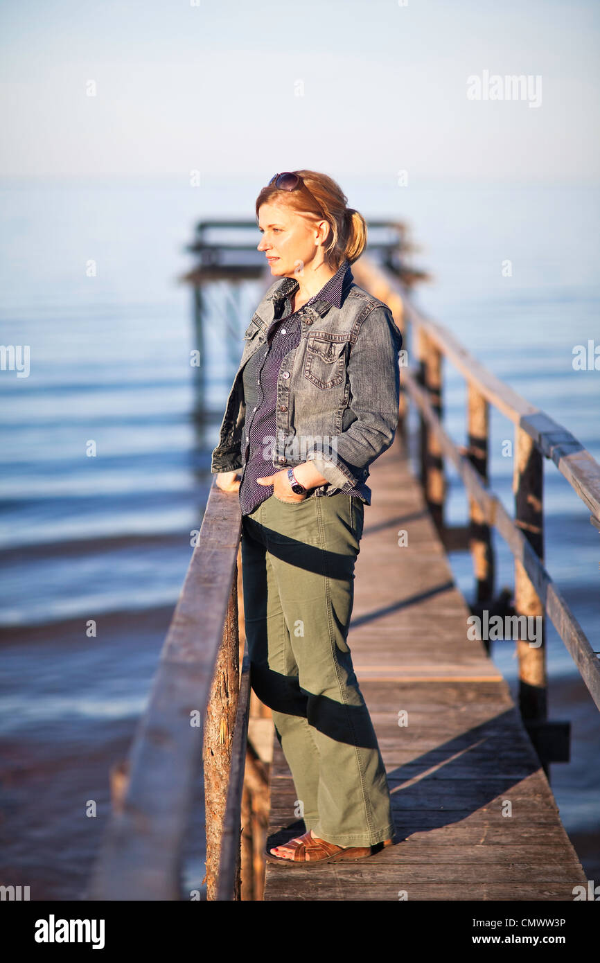 Woman on Pier, Lake Winnipeg, Matlock, Manitoba Stock Photo - Alamy