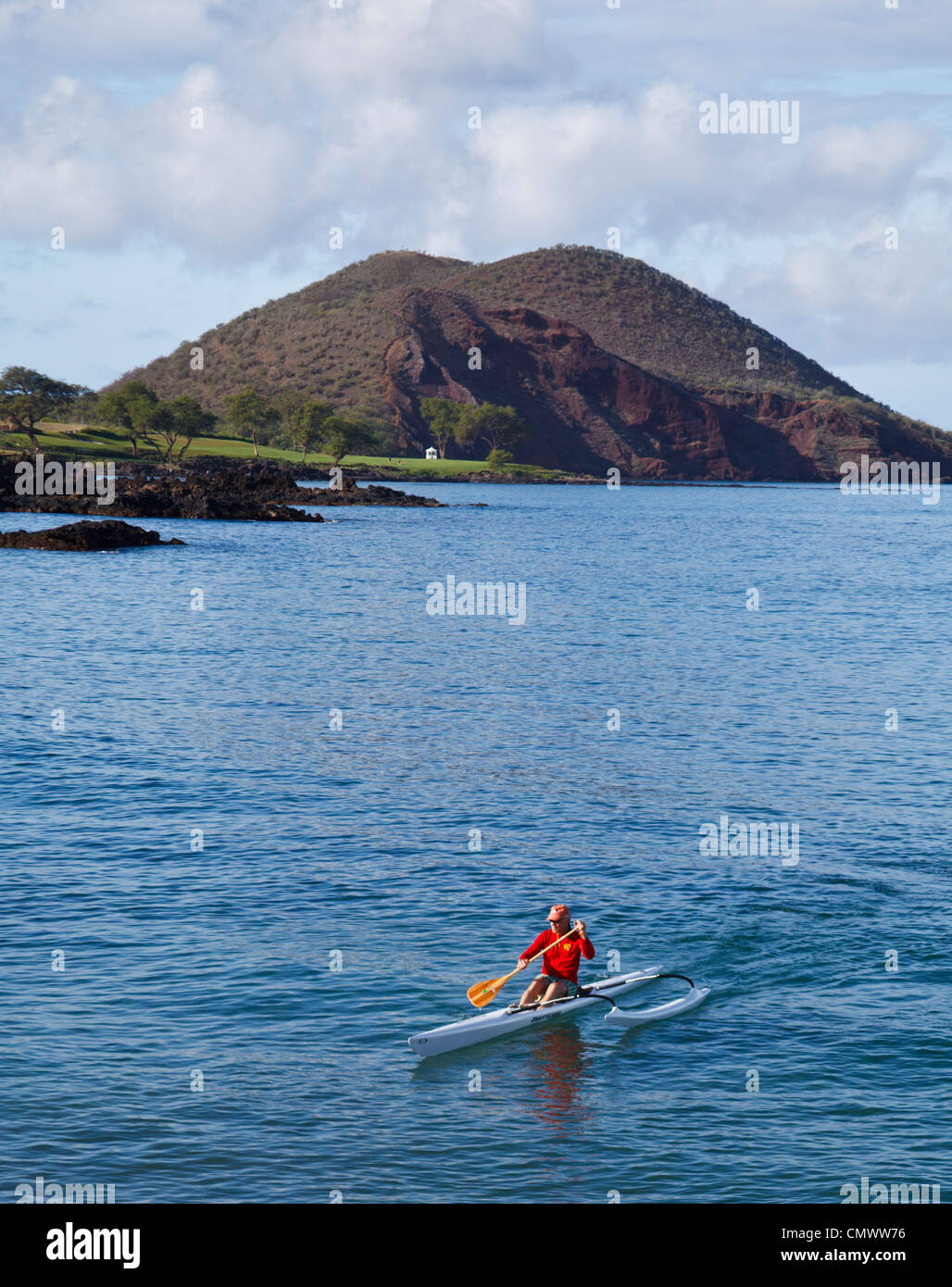 One-person outrigger canoe approaching Makena Landing on Maui Stock ...