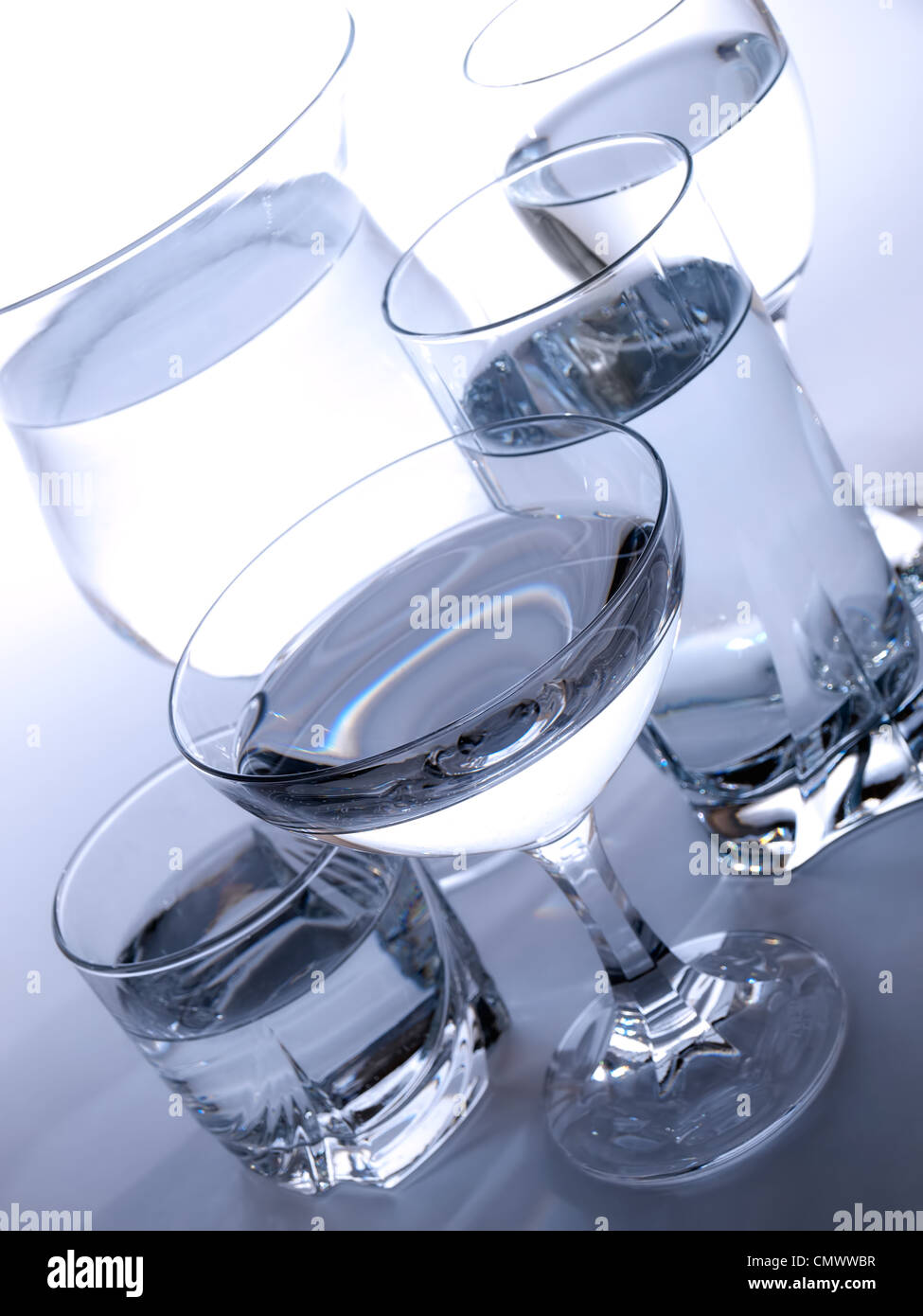 Various types of glasses full of water Stock Photo - Alamy