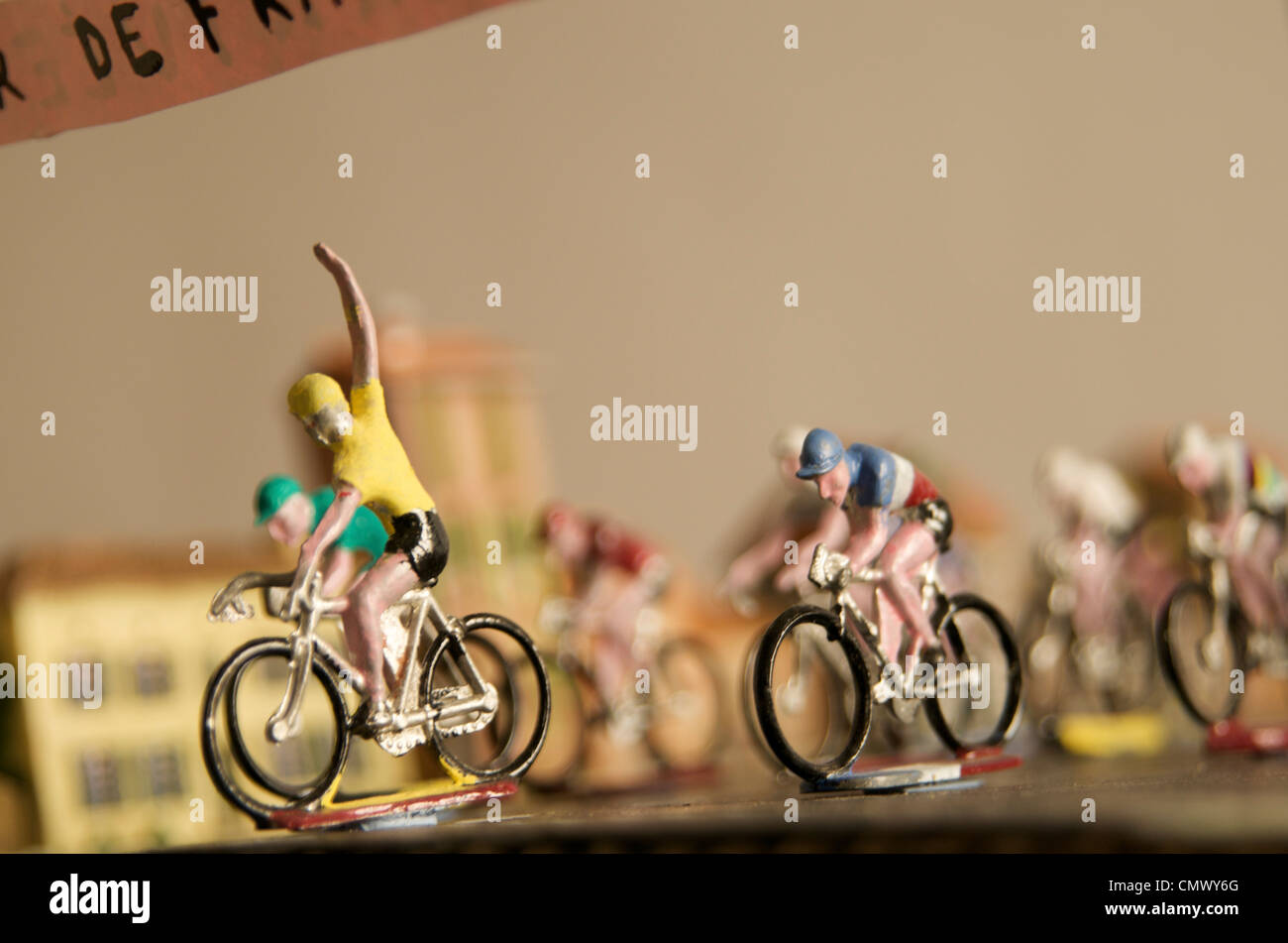 Cycling figurines showcase competitive spirit during a race setup for ...