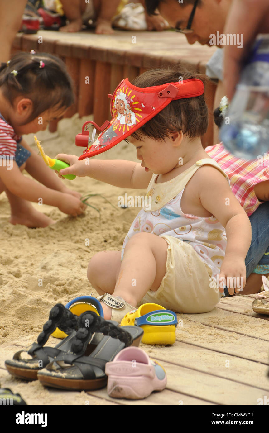 Little babies at the sand hi-res stock photography and images - Alamy
