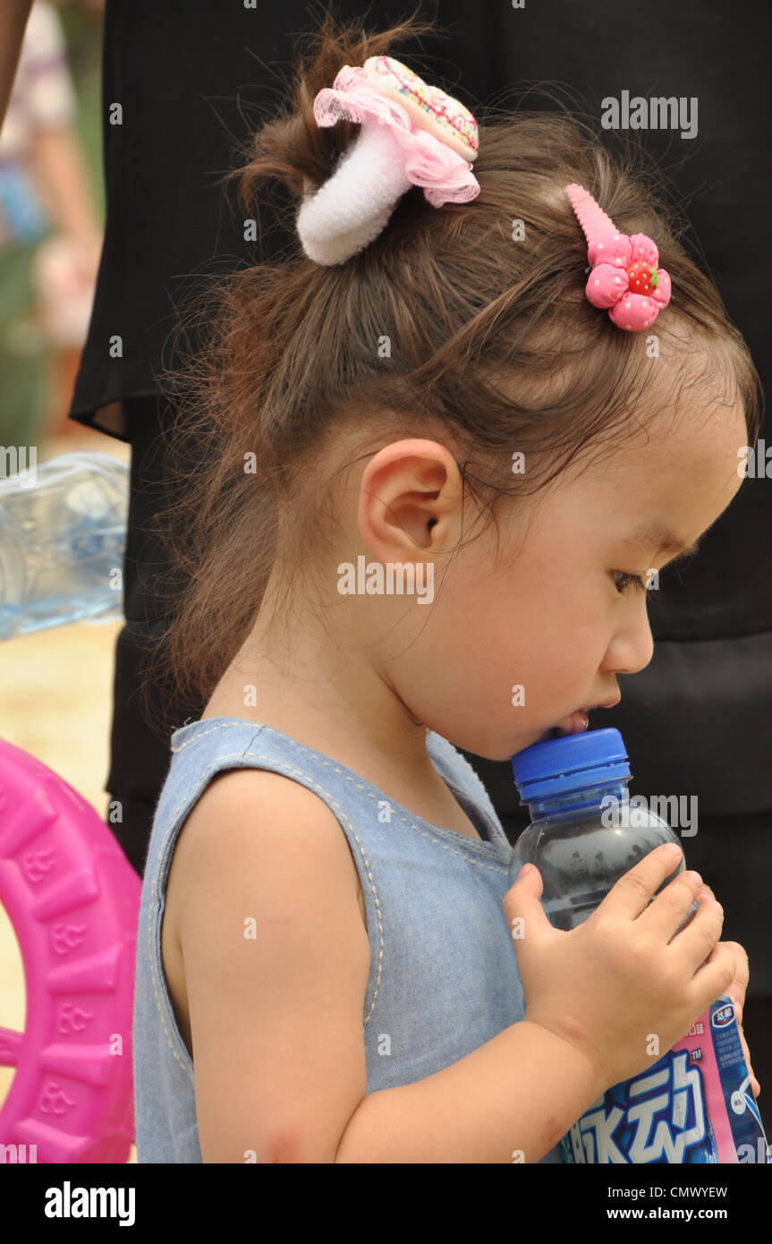 Cute chinese baby girl thinking hi-res stock photography and images - Alamy