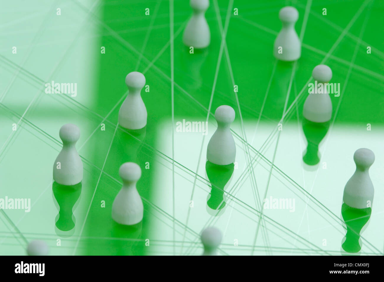 White game figurines on green background Stock Photo - Alamy