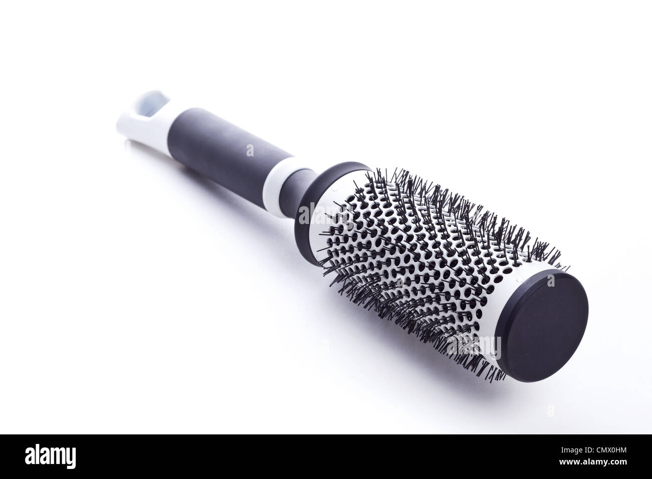 Round comb closeup on white Stock Photo - Alamy