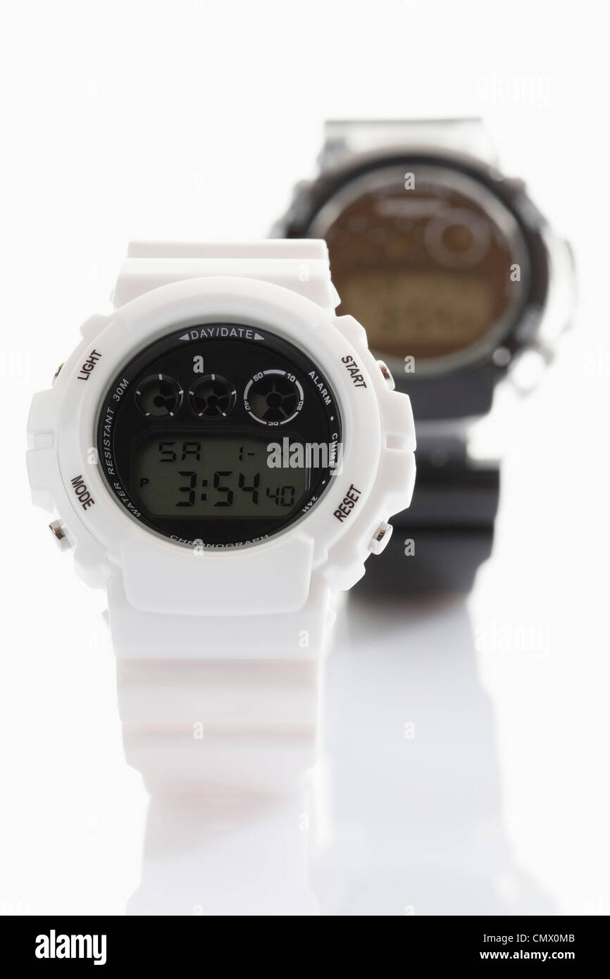 Sporting wrist watches on white background, close up Stock Photo - Alamy
