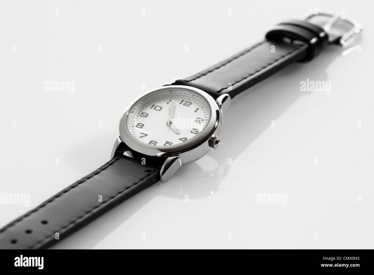 Wrist watch on white background, close up Stock Photo - Alamy