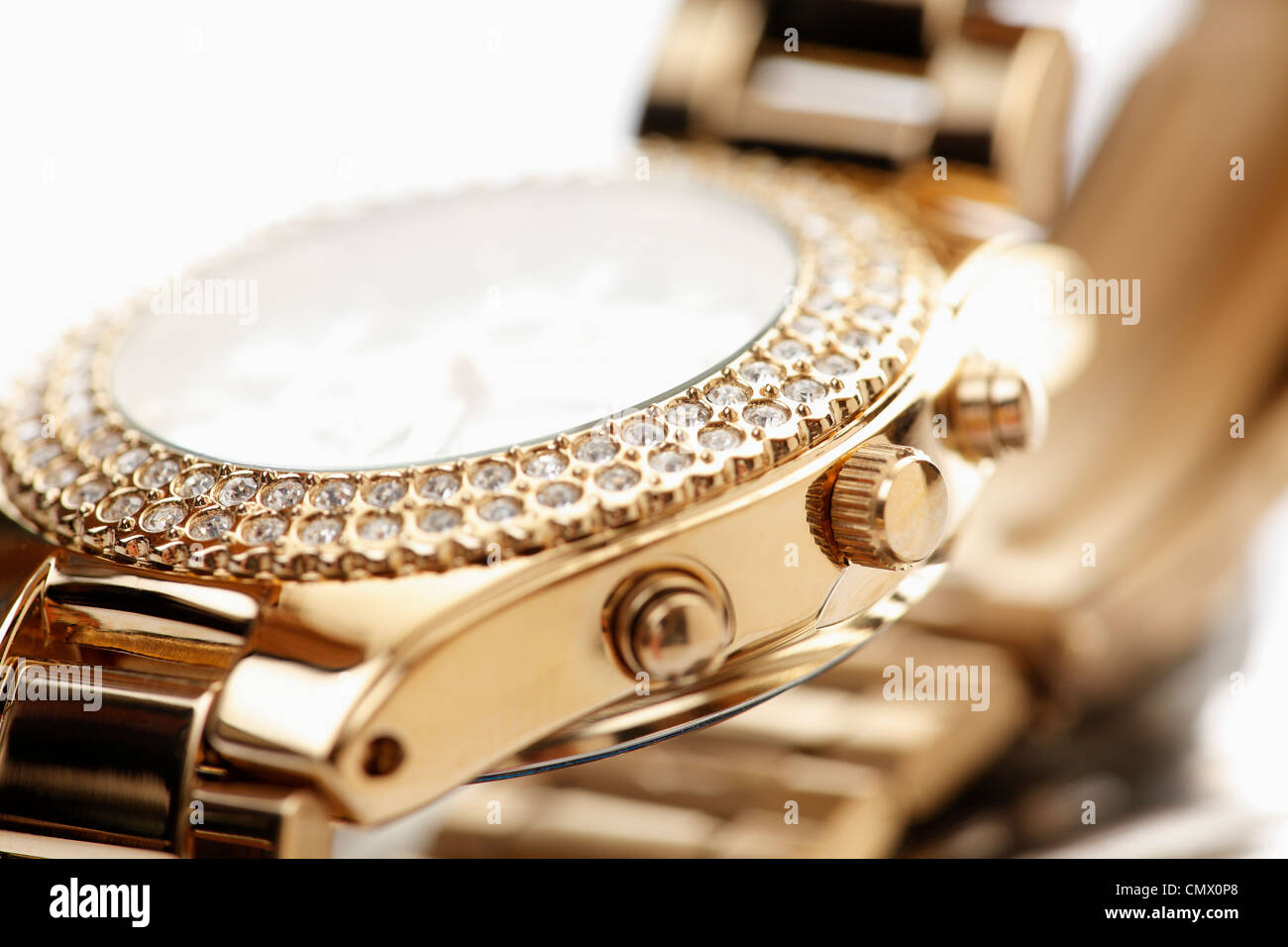 Golden wrist watch hi-res stock photography and images - Alamy