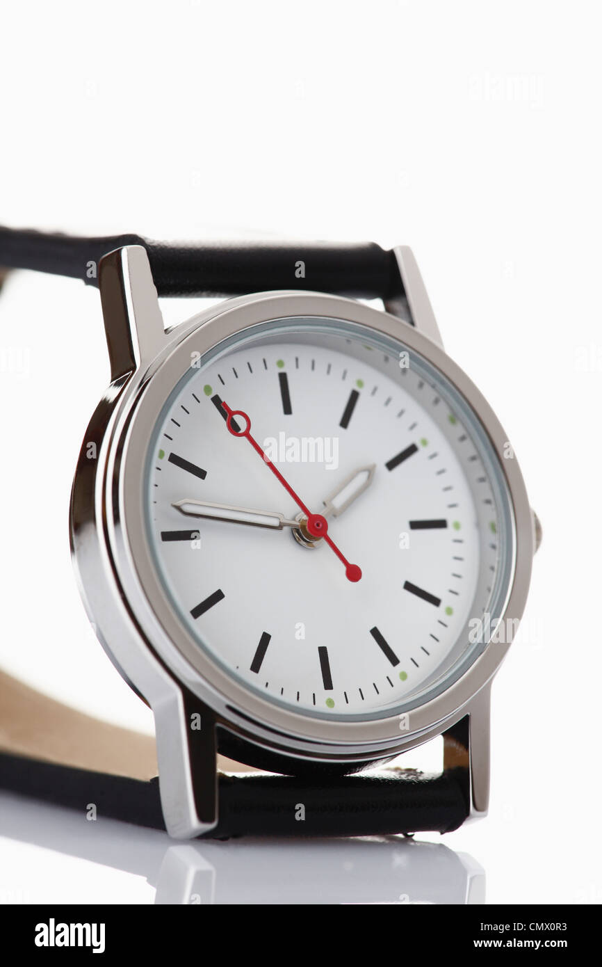 Wrist watch on white background, close up Stock Photo - Alamy