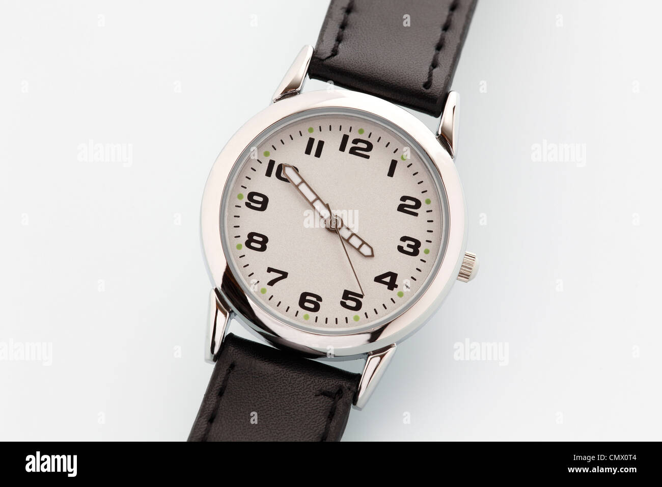 Wrist watch on white background, close up Stock Photo - Alamy