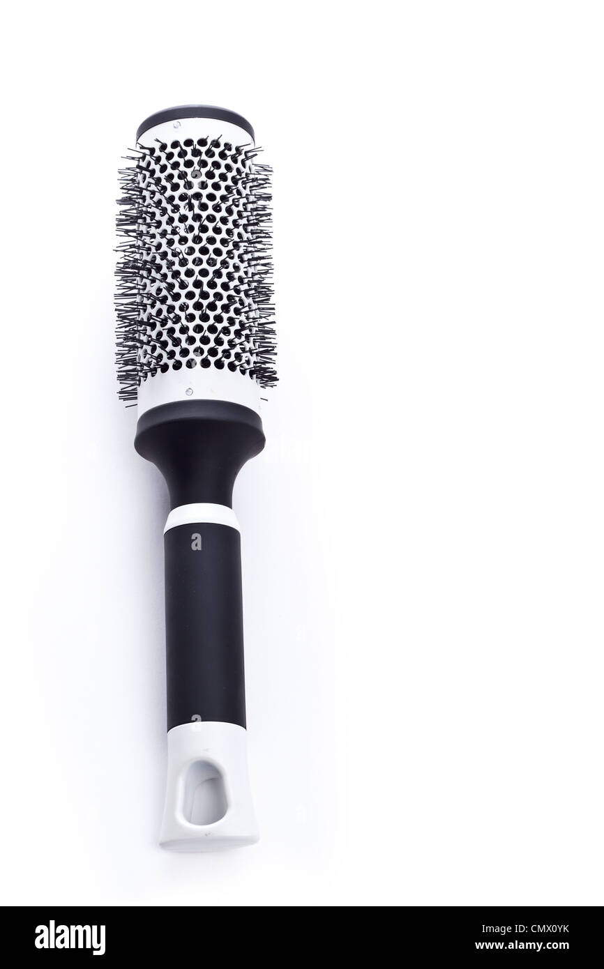 Round hair styler closeup on white background Stock Photo - Alamy