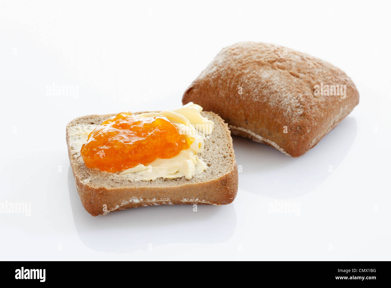 Bread with with butter and jam on white background Stock Photo - Alamy