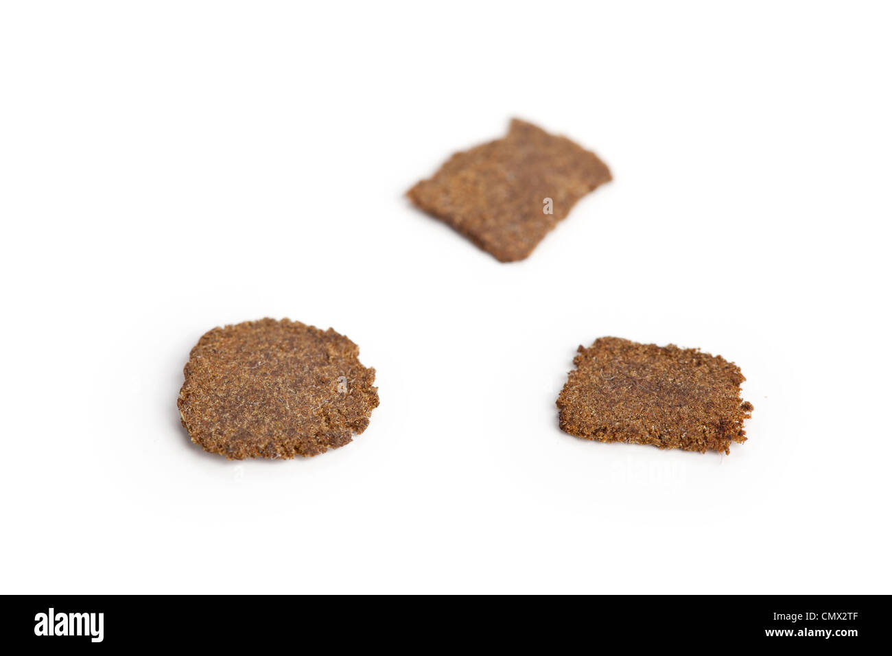 Pieces of hashish isolated on white background Stock Photo - Alamy