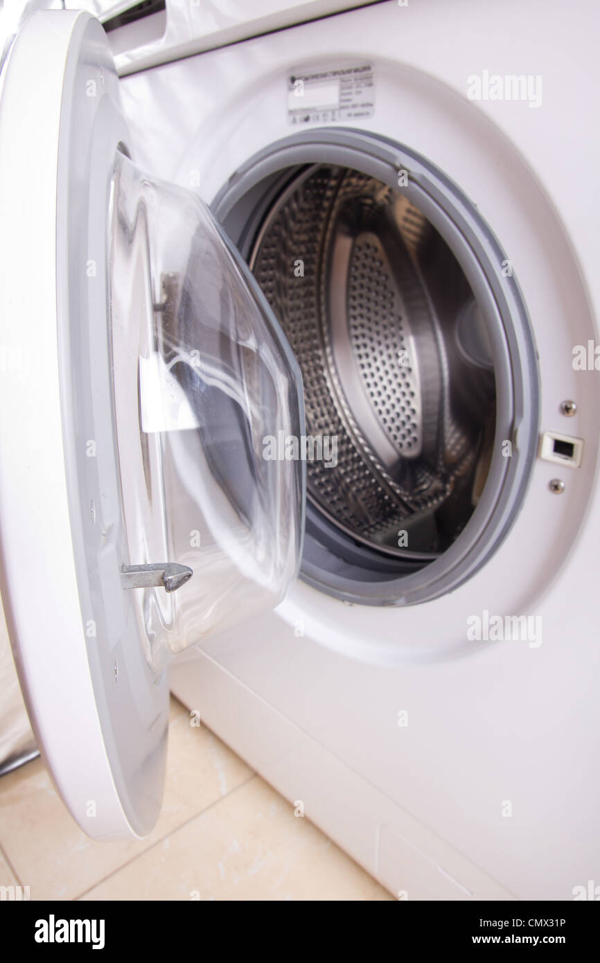 Door of white wash machine, close up Stock Photo - Alamy