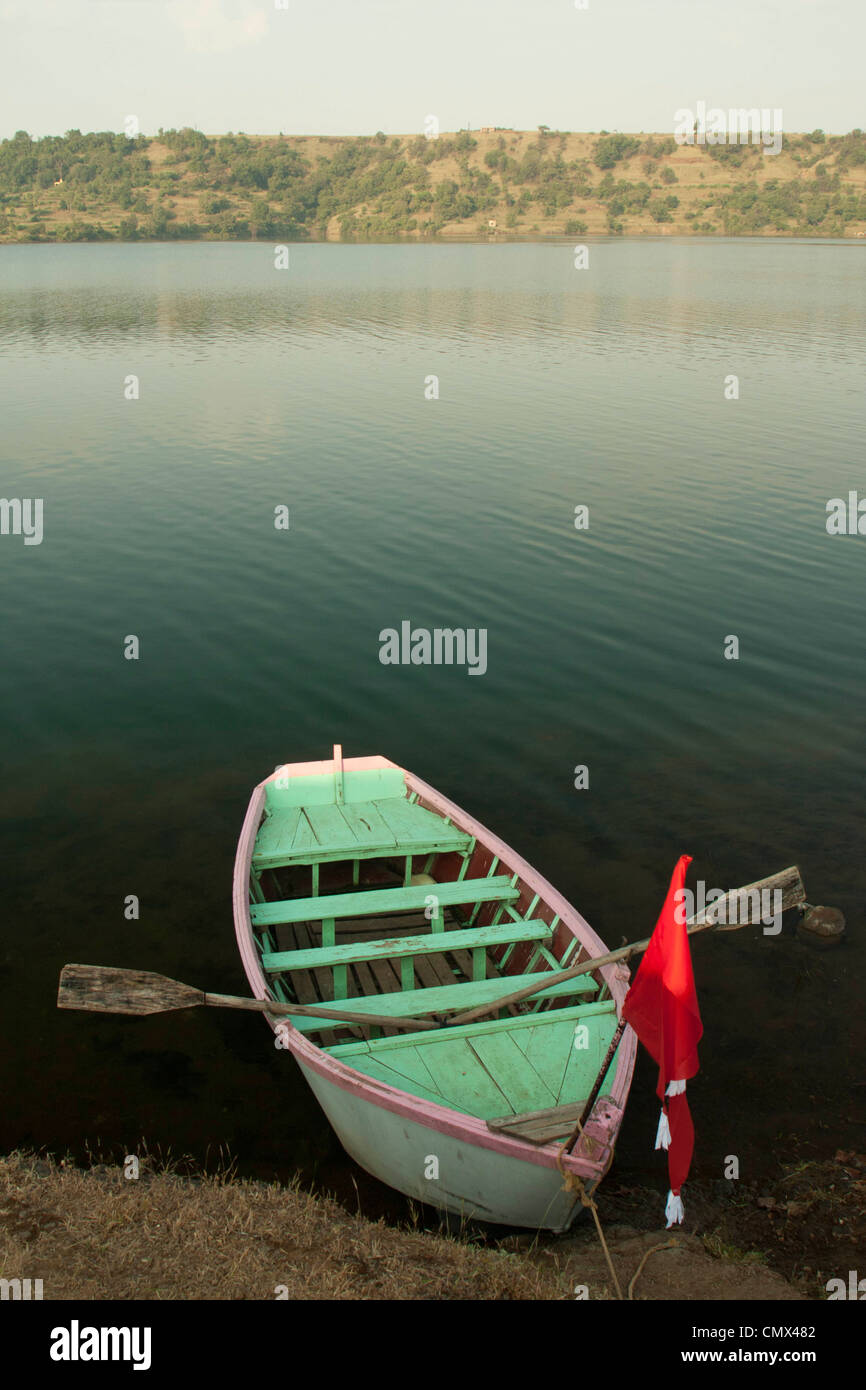Rowing boat moored on indian lake Stock Photo - Alamy