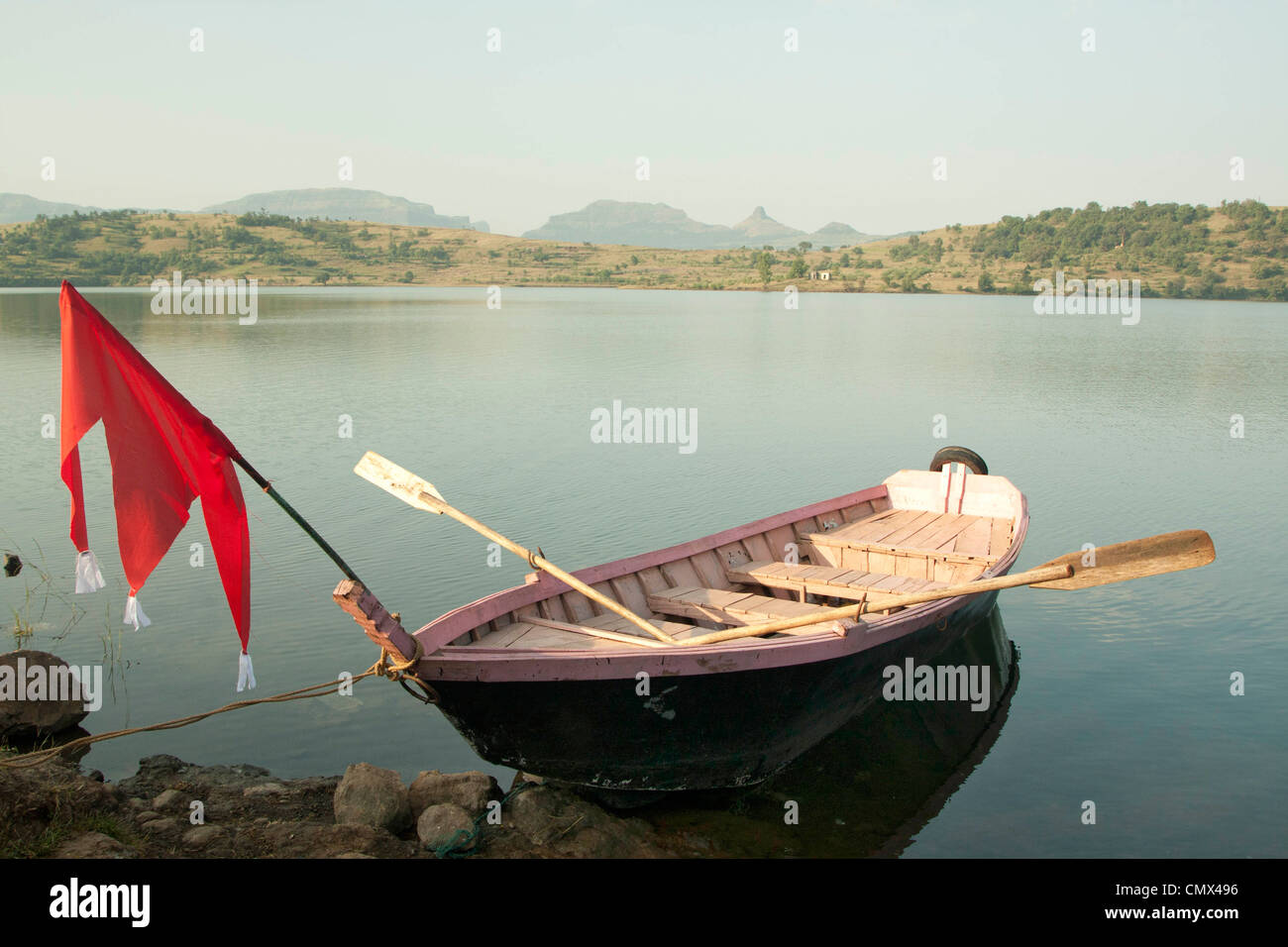 Rowing boat moored on indian lake Stock Photo - Alamy