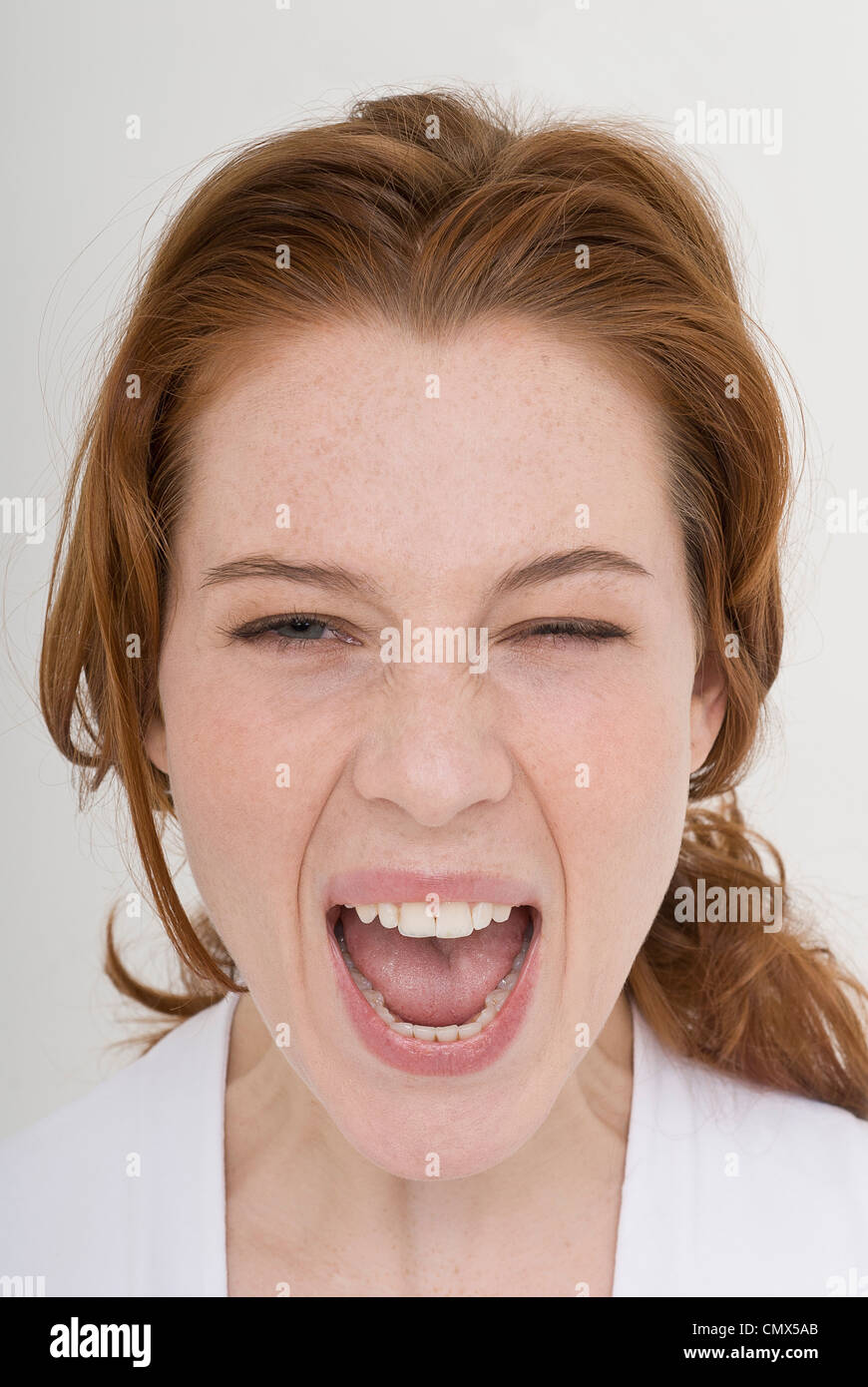 Young woman screaming, close up Stock Photo - Alamy