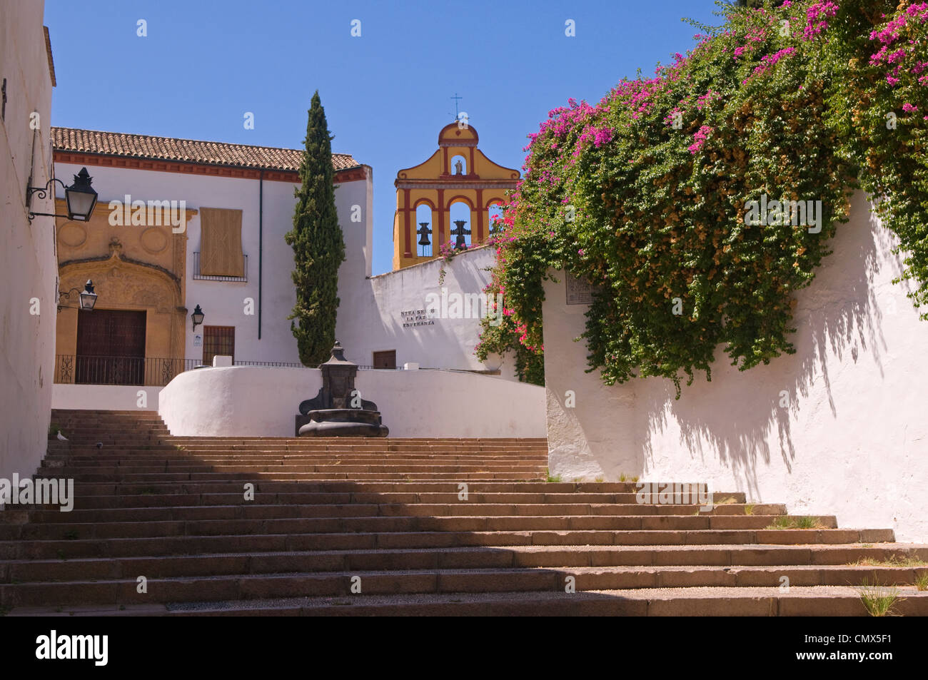 A Capuchin monastery viewed from some steps in Cordoba, Andalucia ...