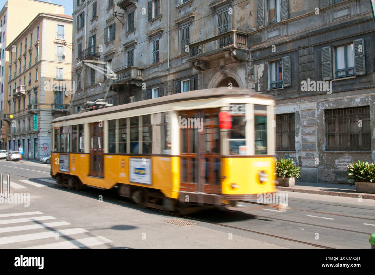Vintage yellow tram car in Milan Stock Photo - Alamy