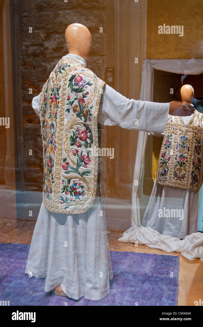 Italian Ecclesiastical gowns / robes in a makers shop window Stock ...
