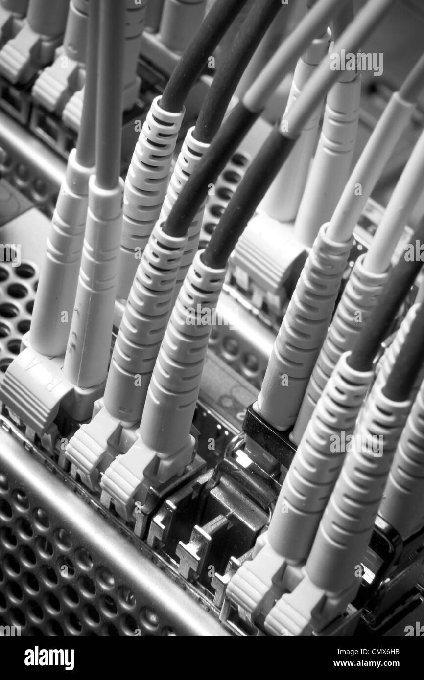 optic fiber cables connected to hub Stock Photo - Alamy