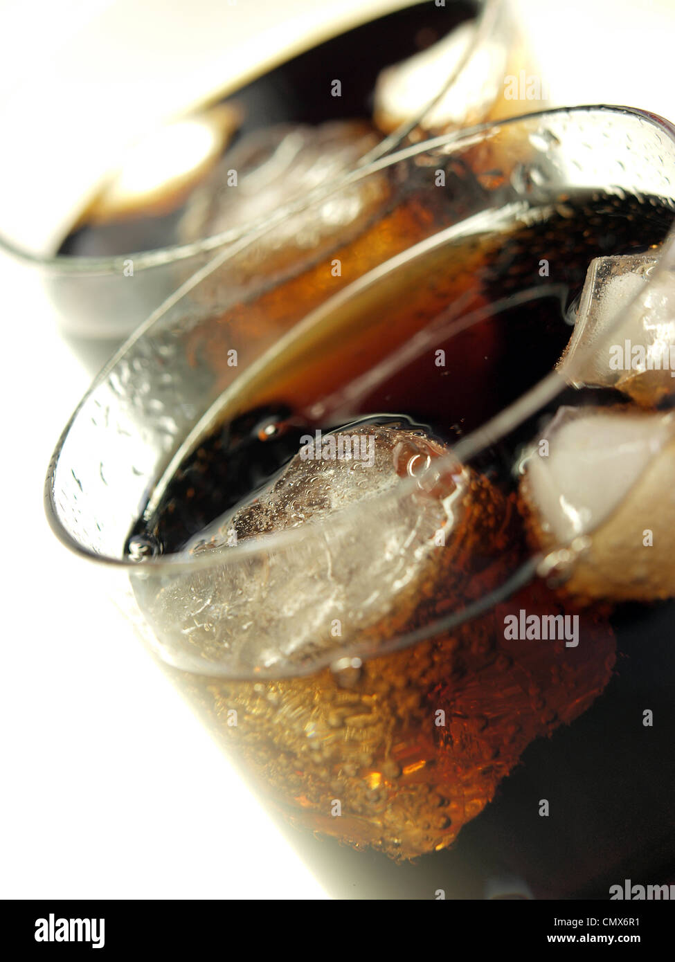 Tall glass of cola with ice cubes hi-res stock photography and images ...