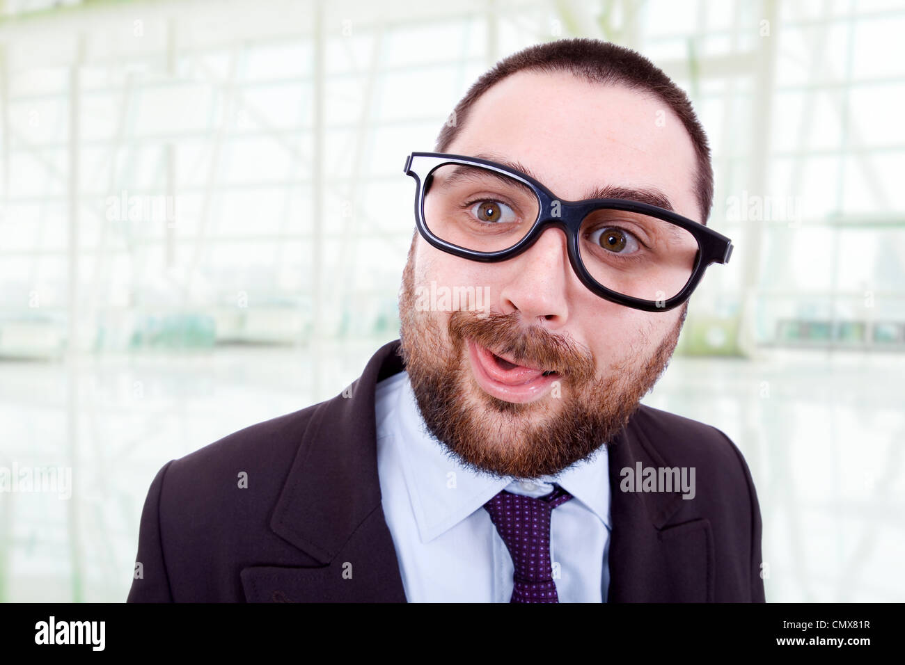young silly businessman portrait at the office Stock Photo - Alamy