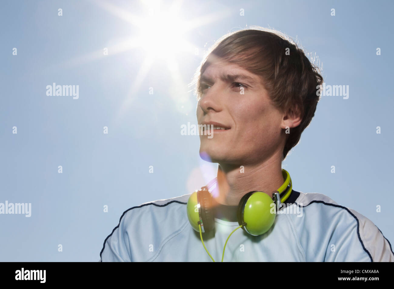 Germany, Bavaria, Munich, Young man with head phones Stock Photo - Alamy