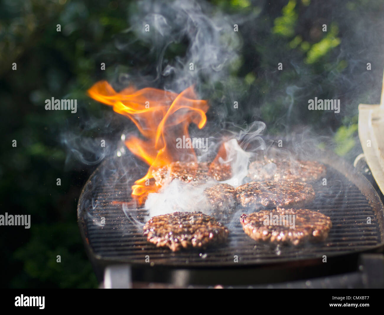 Germany, Munich, Ground beef on barbecue grill, close up Stock Photo ...