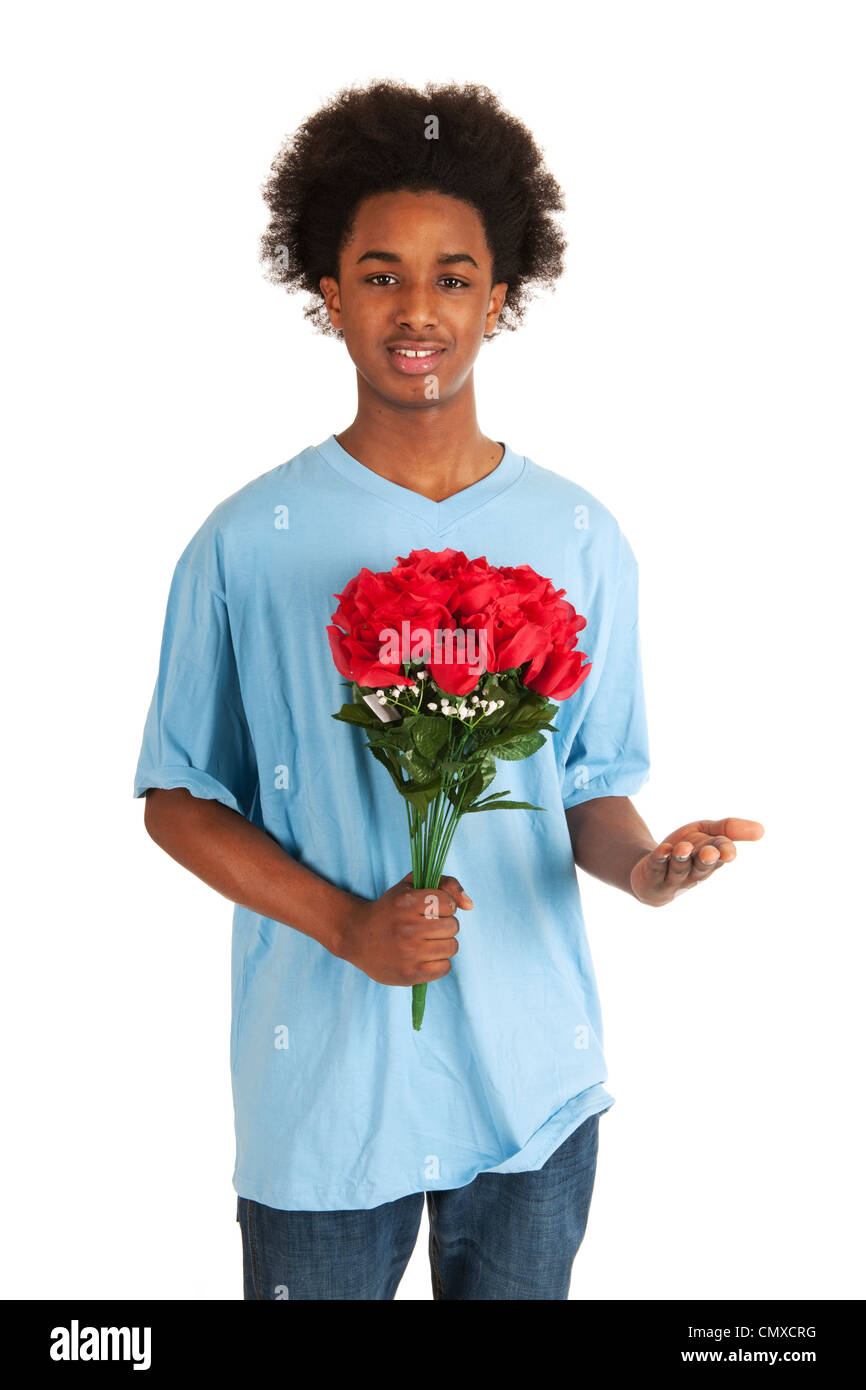 Black teen boy is giving bouquet of red flowers Stock Photo - Alamy