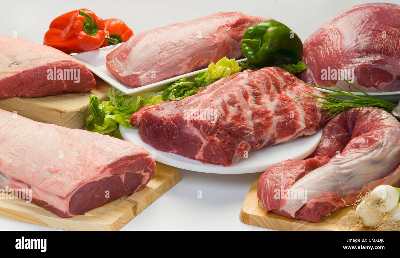 fresh raw cuts of meat with vegetables Stock Photo - Alamy