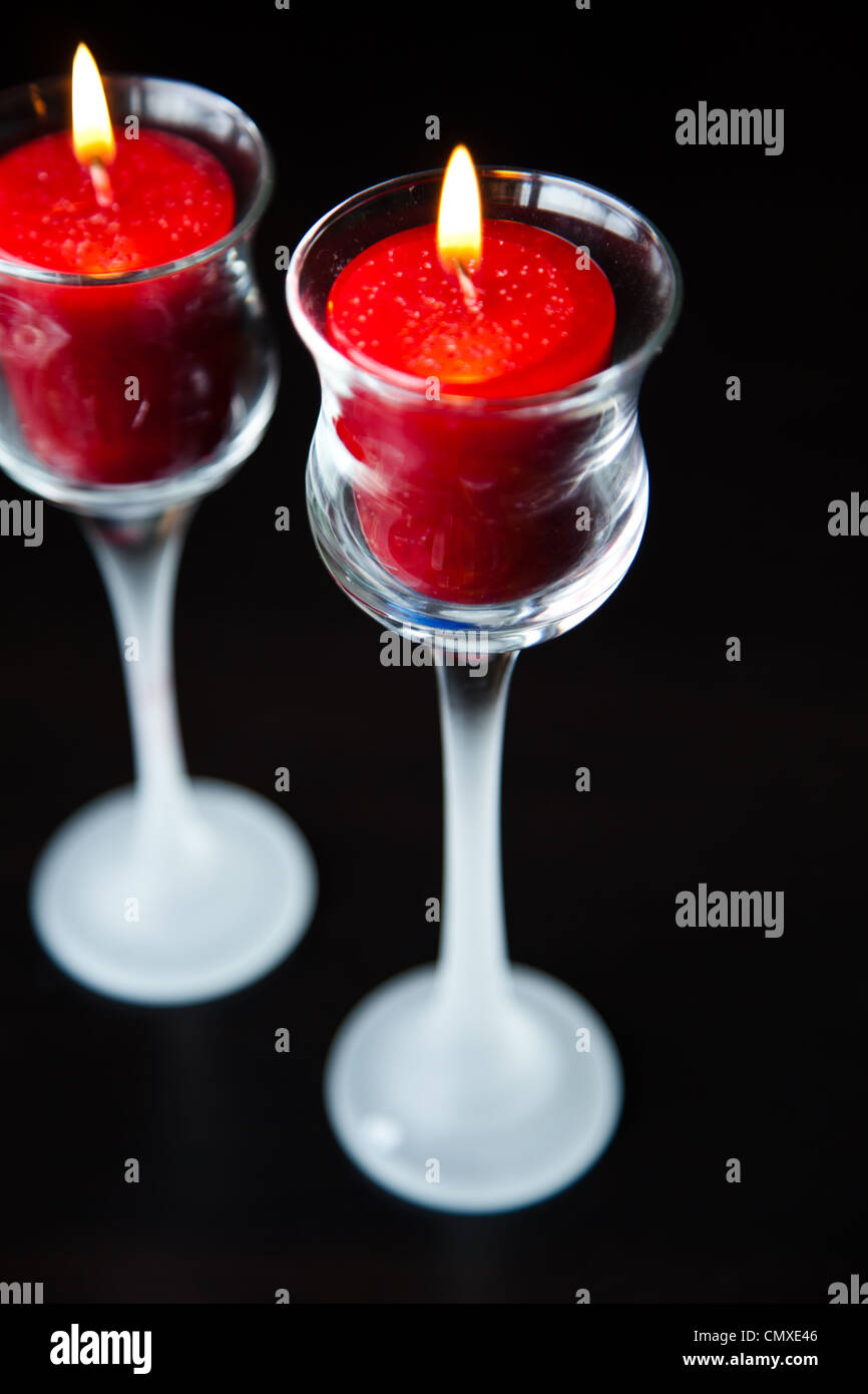 Two Red Candles on a Black Background Stock Photo - Alamy