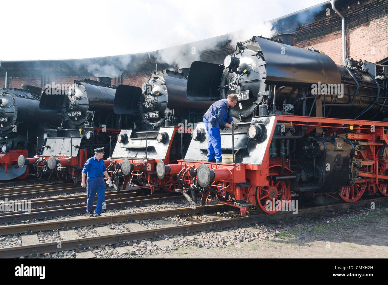 German Steam locomotives being cleaned at Hilbersdorf Steam Shed Stock ...