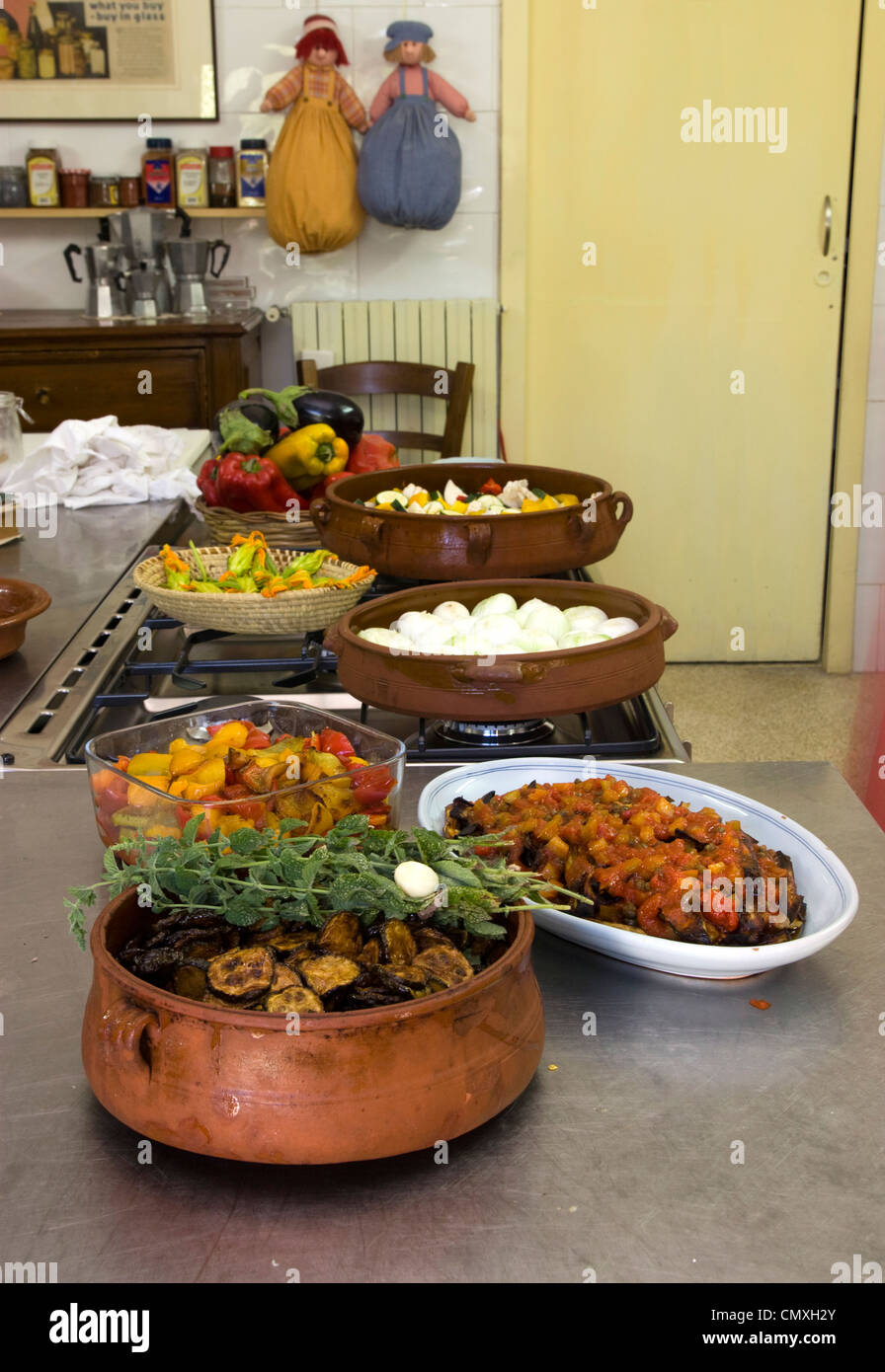 Making of vegetarian food in earthenware container Stock Photo - Alamy
