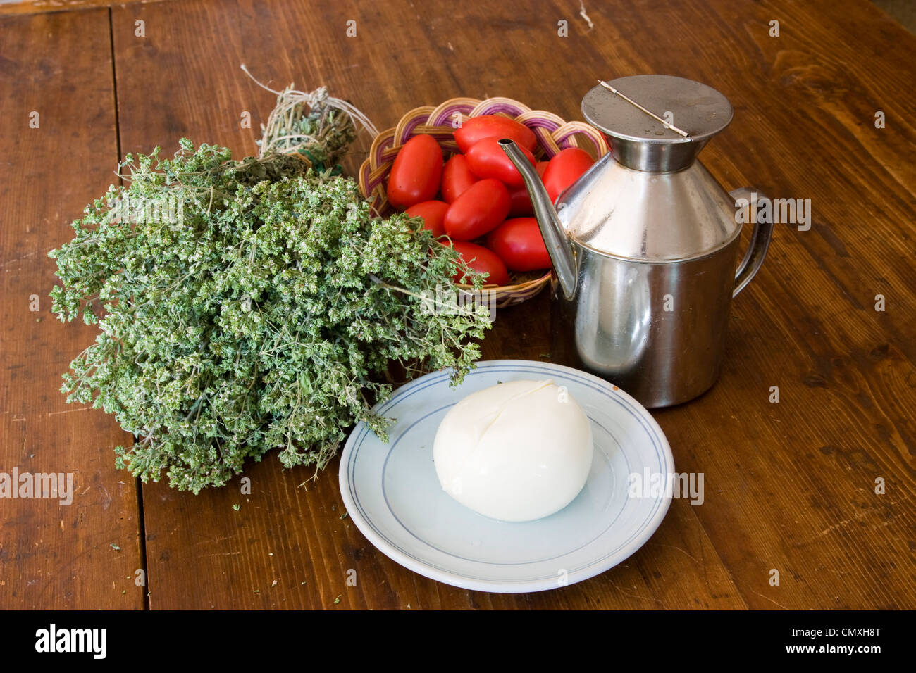 Typical italian cuisine ingredients as oil, oregano and tomatoes Stock ...