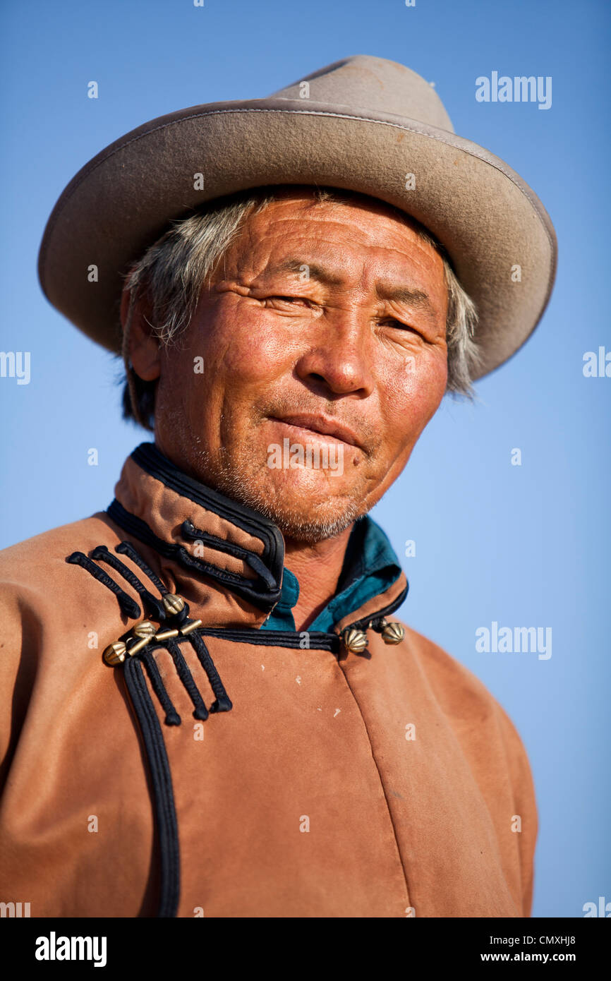 Mongolian man portrait at Khongor sand dune, Mongolia Stock Photo - Alamy