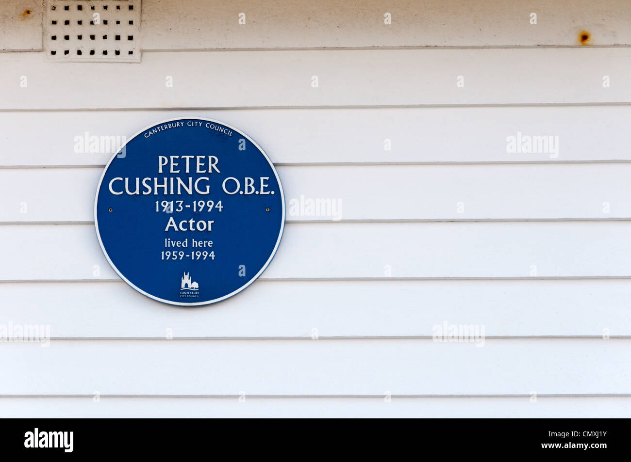 Blue plaque on a house on Whitstable sea front, previously occupied by the actor Peter Cushing ...