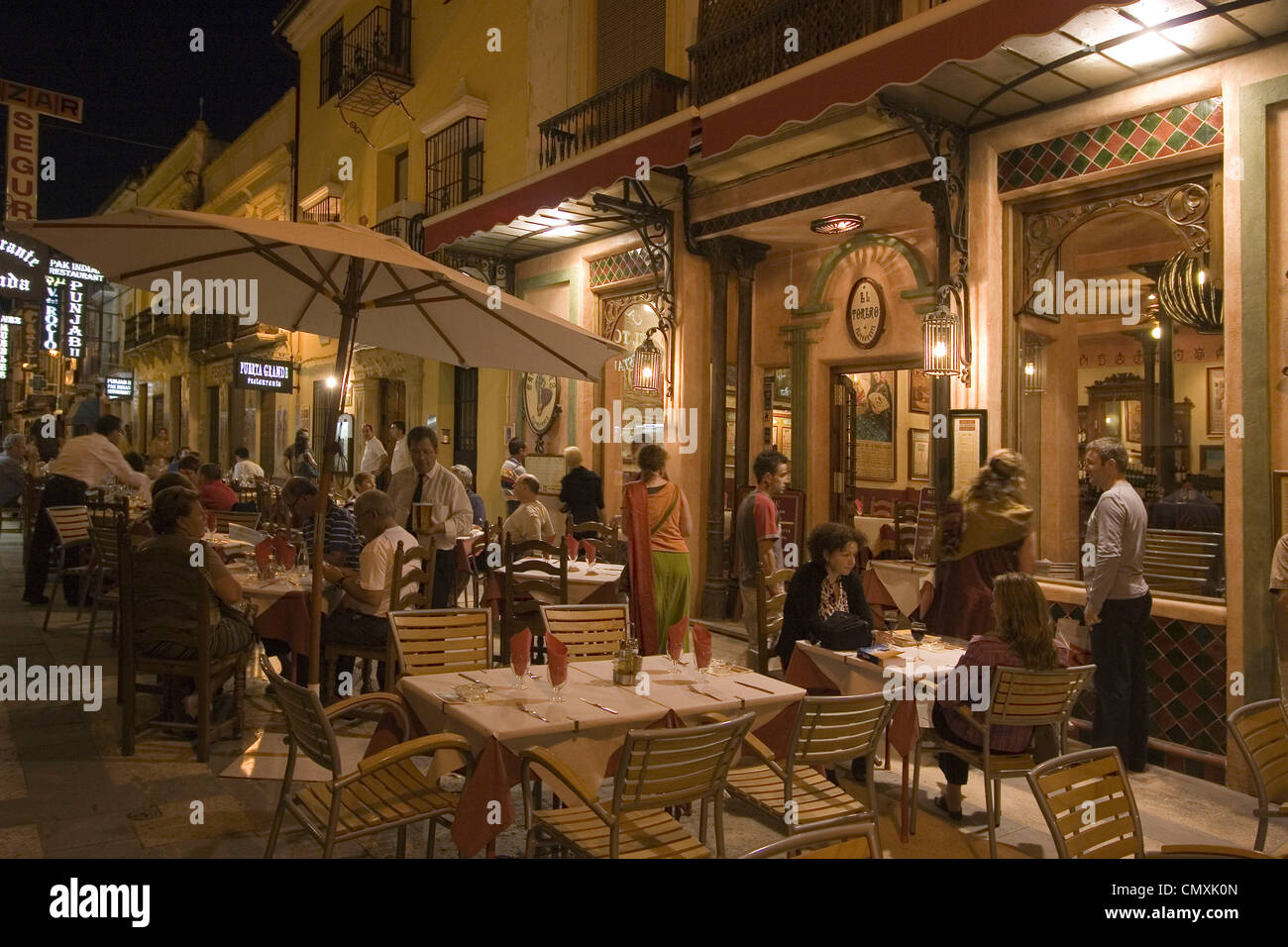 Spain Andalucia Restaurants outdoor at night Stock Photo - Alamy